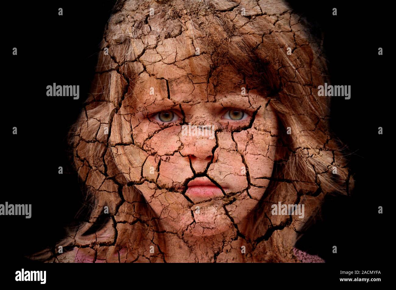 Climate change. Conceptual image of the face of a child breaking up ...