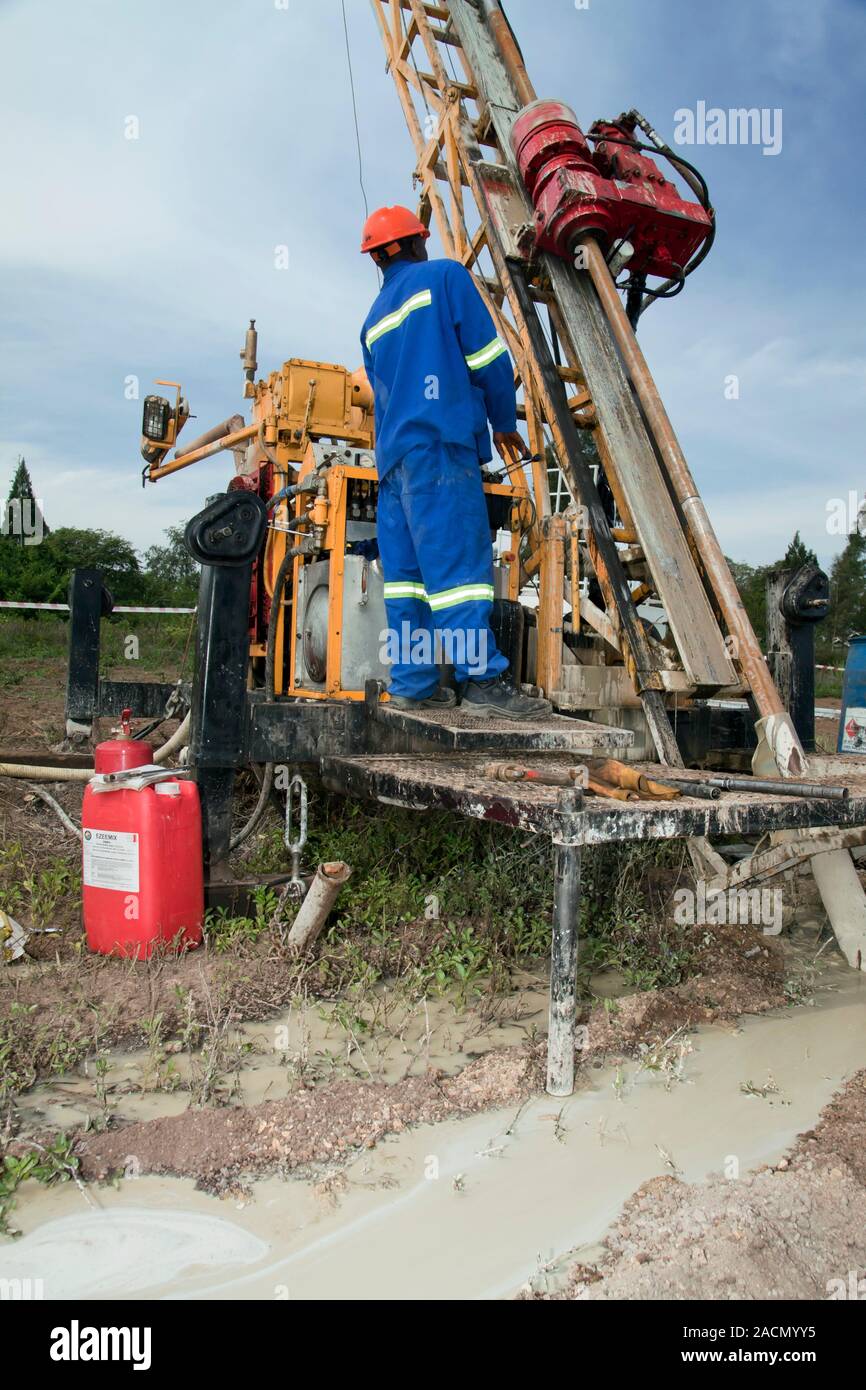 Mineral exploration drilling. Driller operating a multi-combination ...