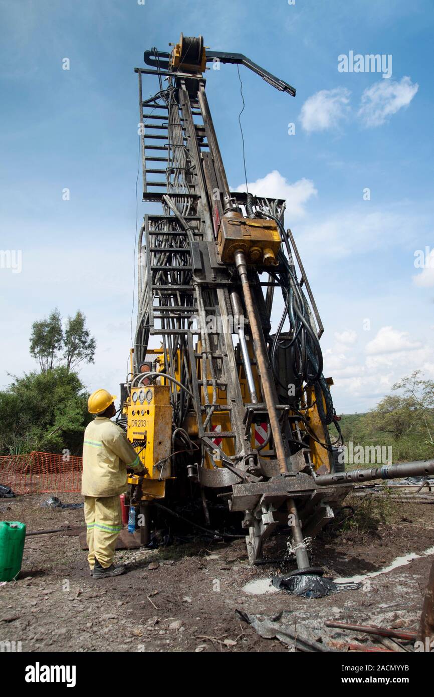 Mineral exploration drilling. Driller operating a multi-combination drilling rig during a ...