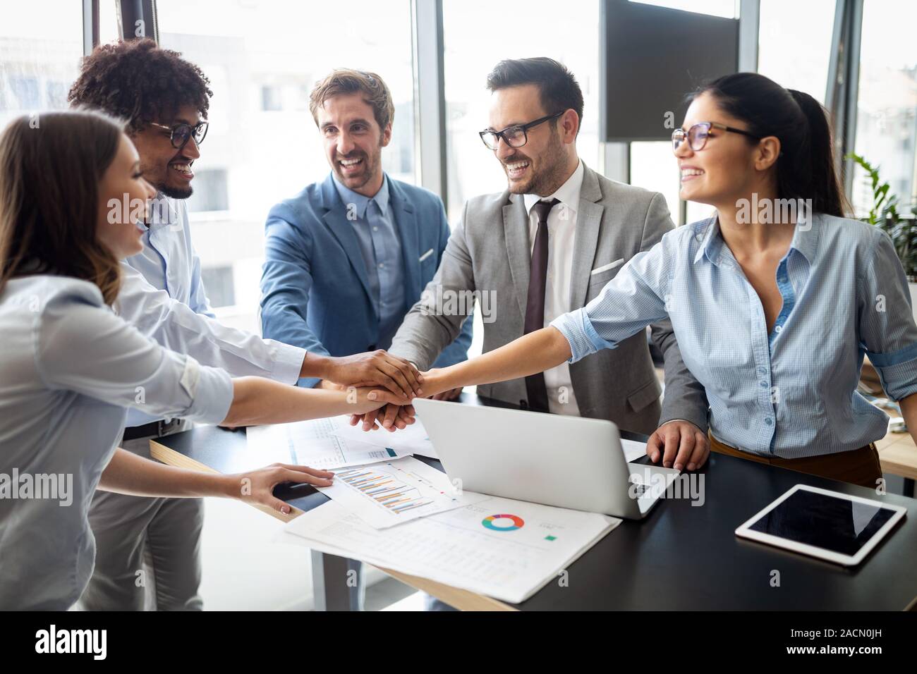 Group of successful business people at work in office Stock Photo - Alamy