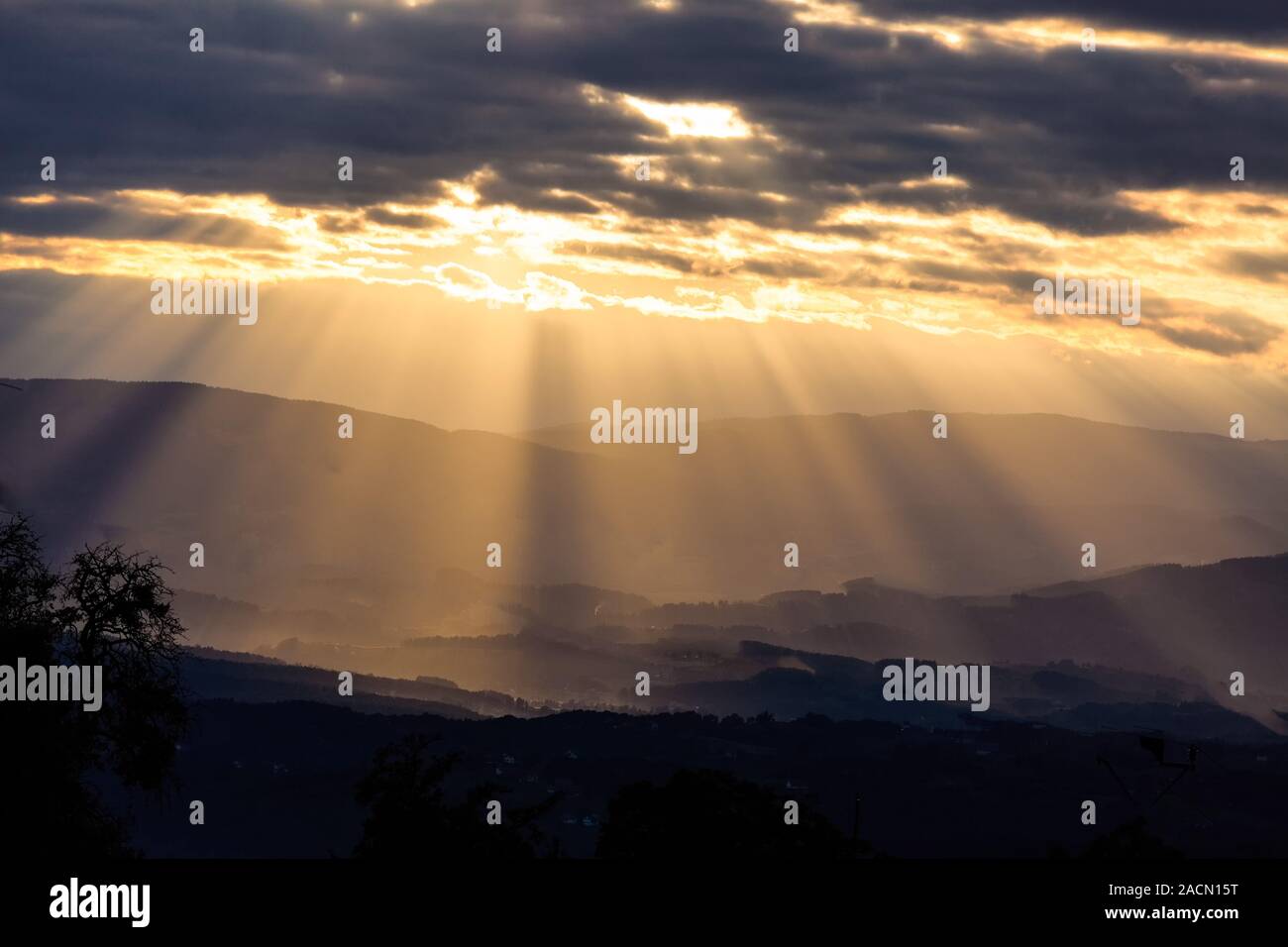 Light rays in the evening sky Stock Photo - Alamy