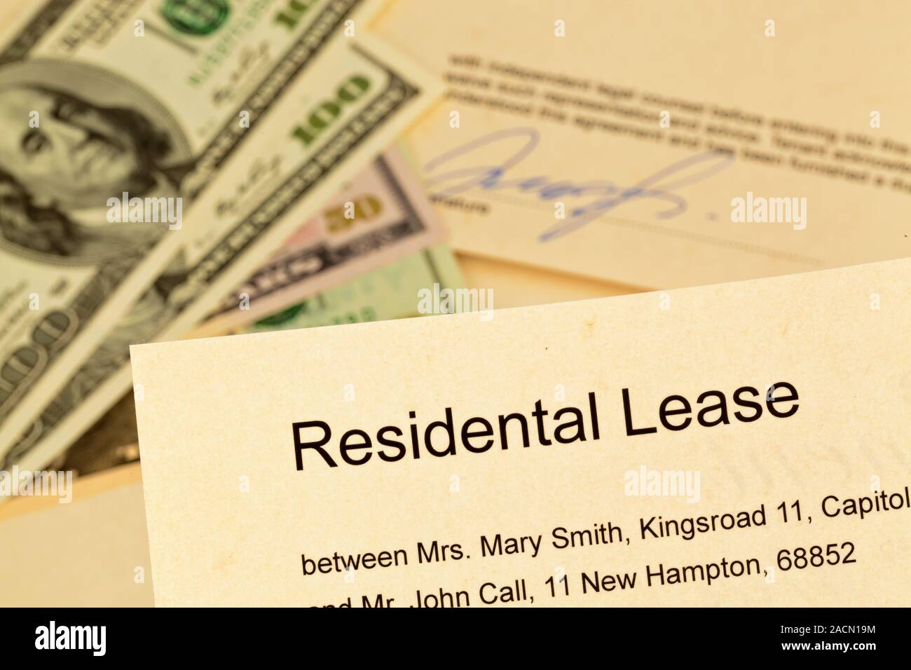 Key to apartment and tenancy agreement Stock Photo - Alamy
