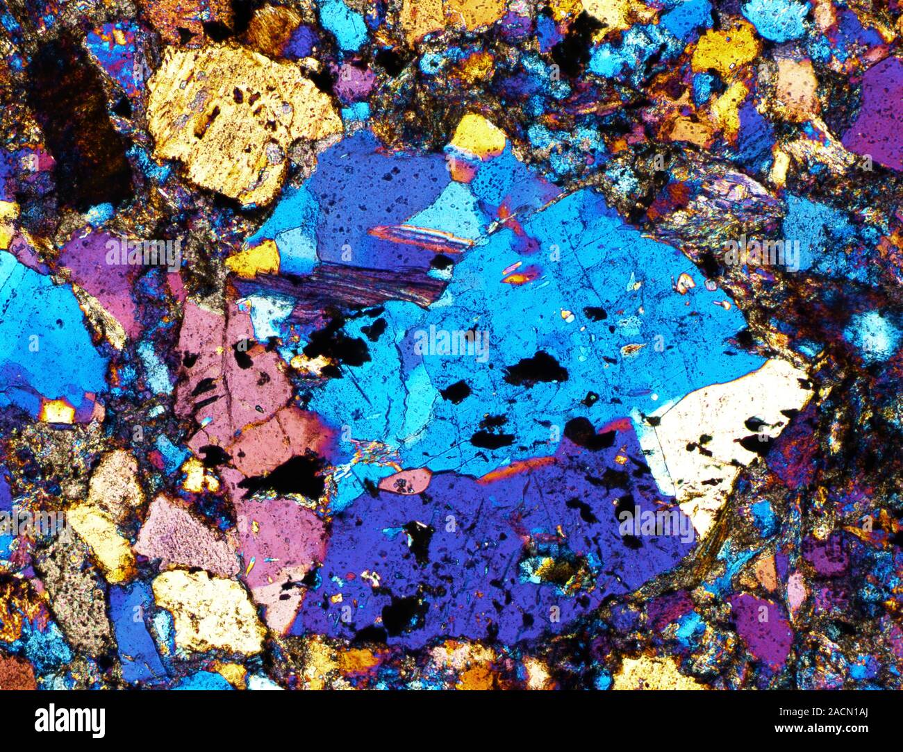Polarised light micrograph of a thin section of 'Greywacke', a ...