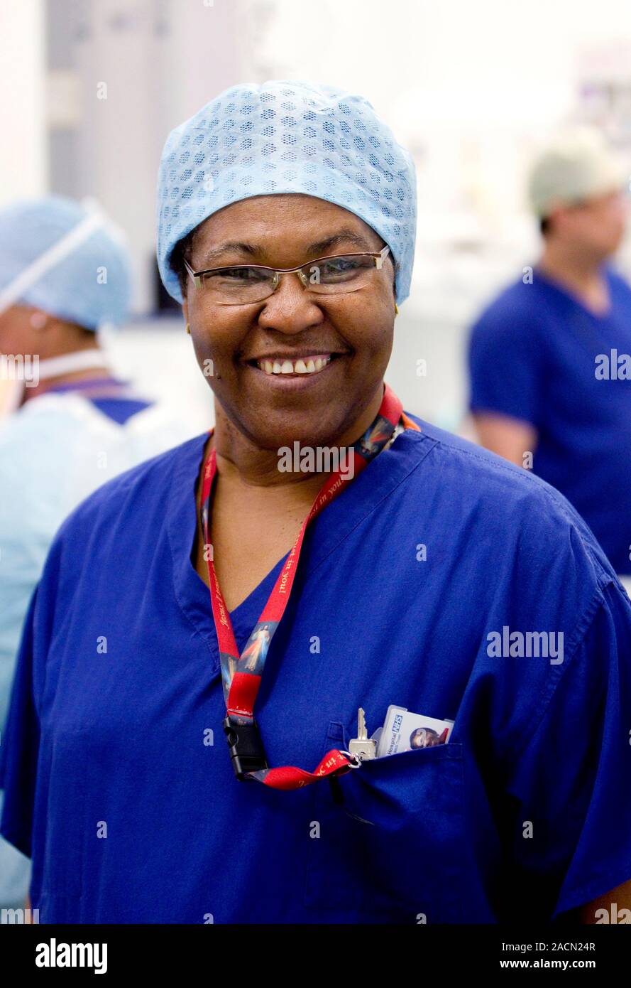 Surgical nurse smiling Stock Photo - Alamy