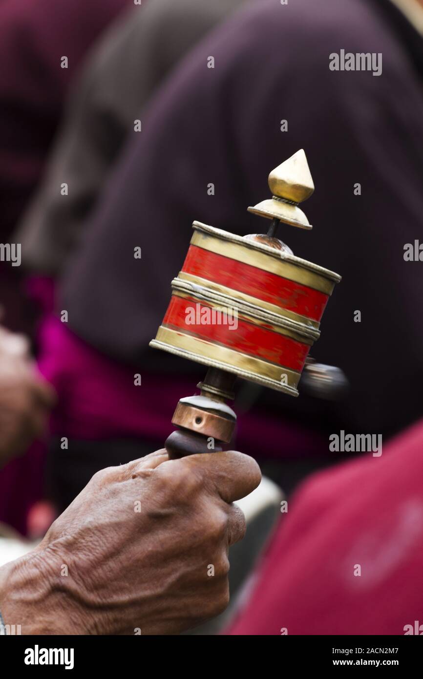 Ladakhi with Tibetan prayer wheel, Ladakh Stock Photo - Alamy