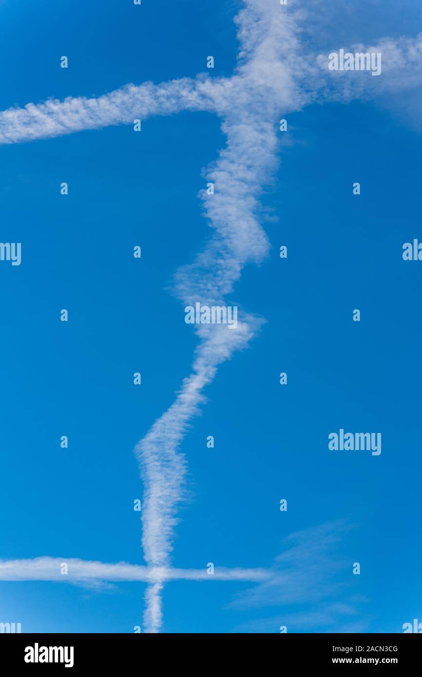 Condensation trails from aircraft Stock Photo - Alamy