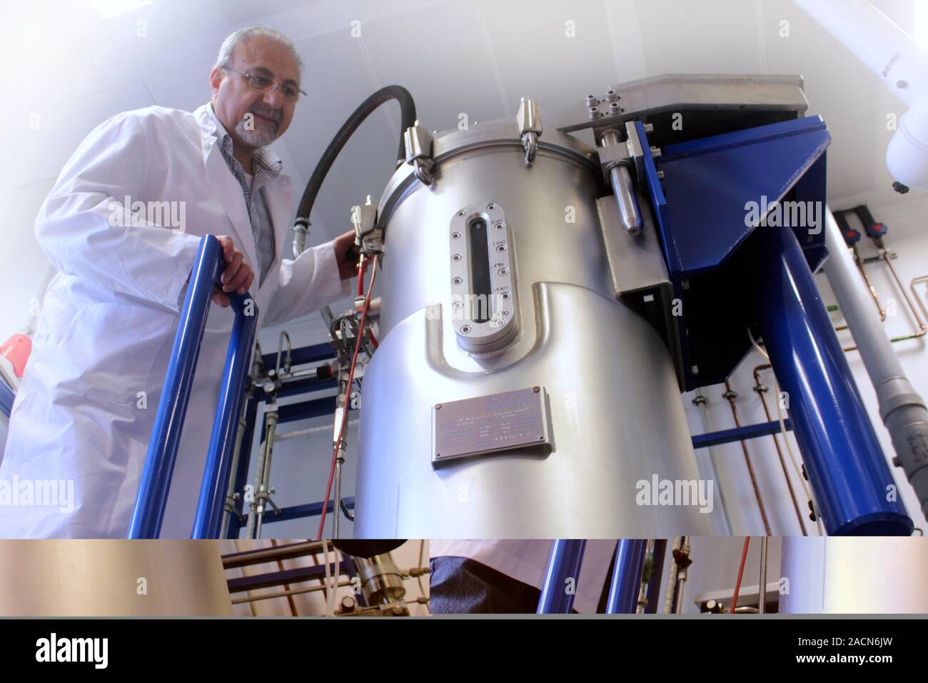 Microbiology laboratory. Microbiologist working with a fermenter that ...