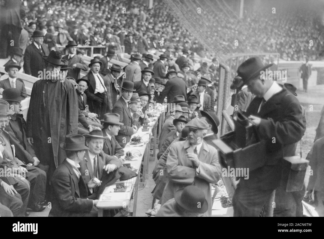 Telegraph operators at a baseball game. Photographed at the Polo ...