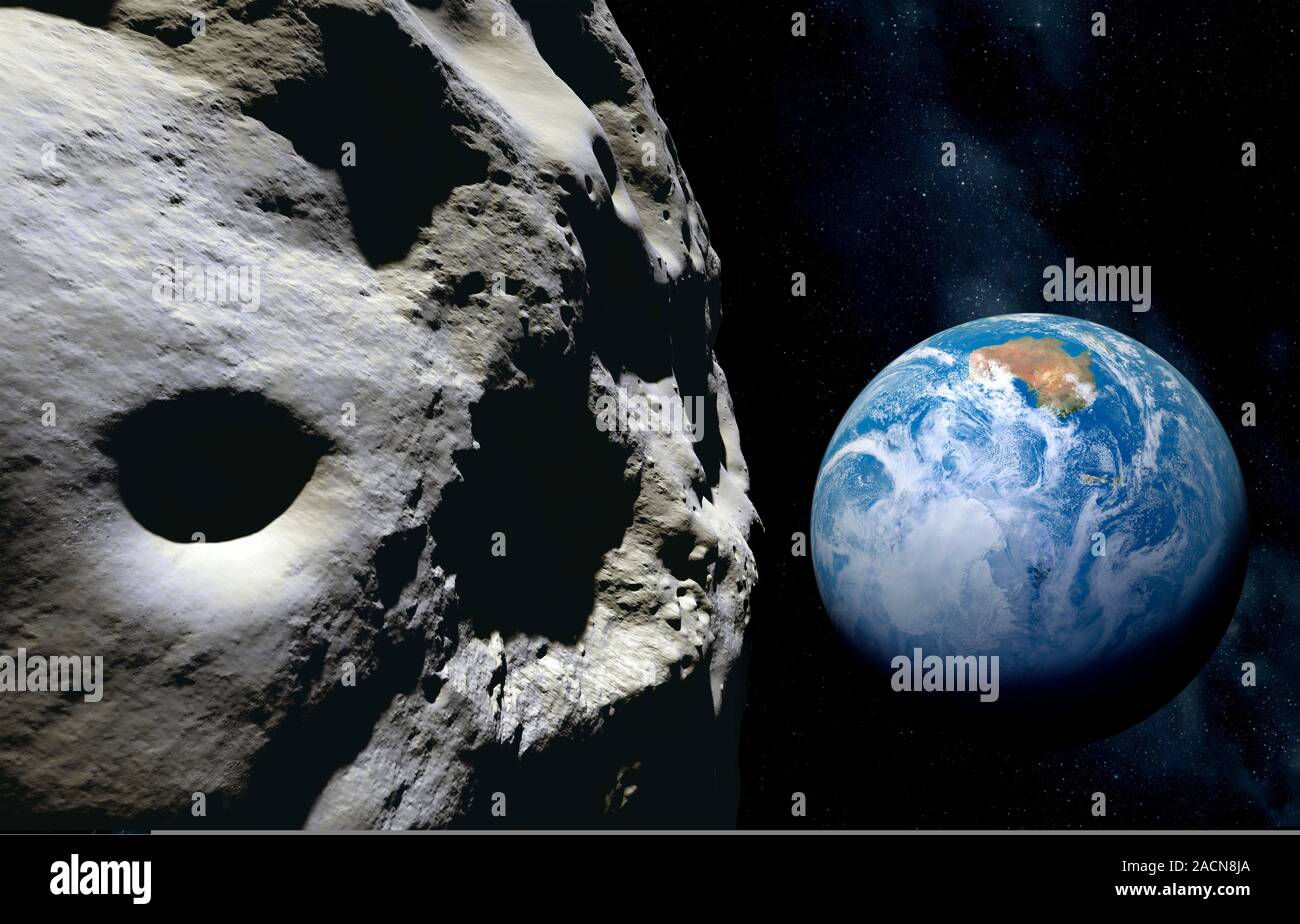 Asteroid approaching Earth. Computer artwork of an asteroid (left ...