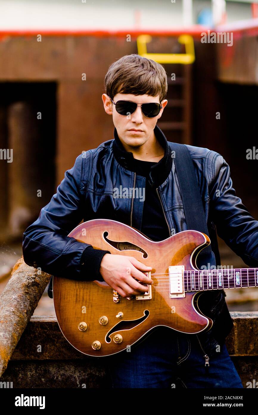 Male masculine musician guitar hi-res stock photography and images - Alamy