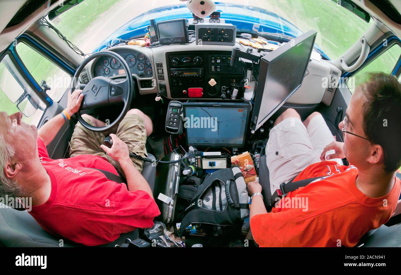 Storm chasing. Tornado researchers inside a Doppler on Wheels (DOW ...