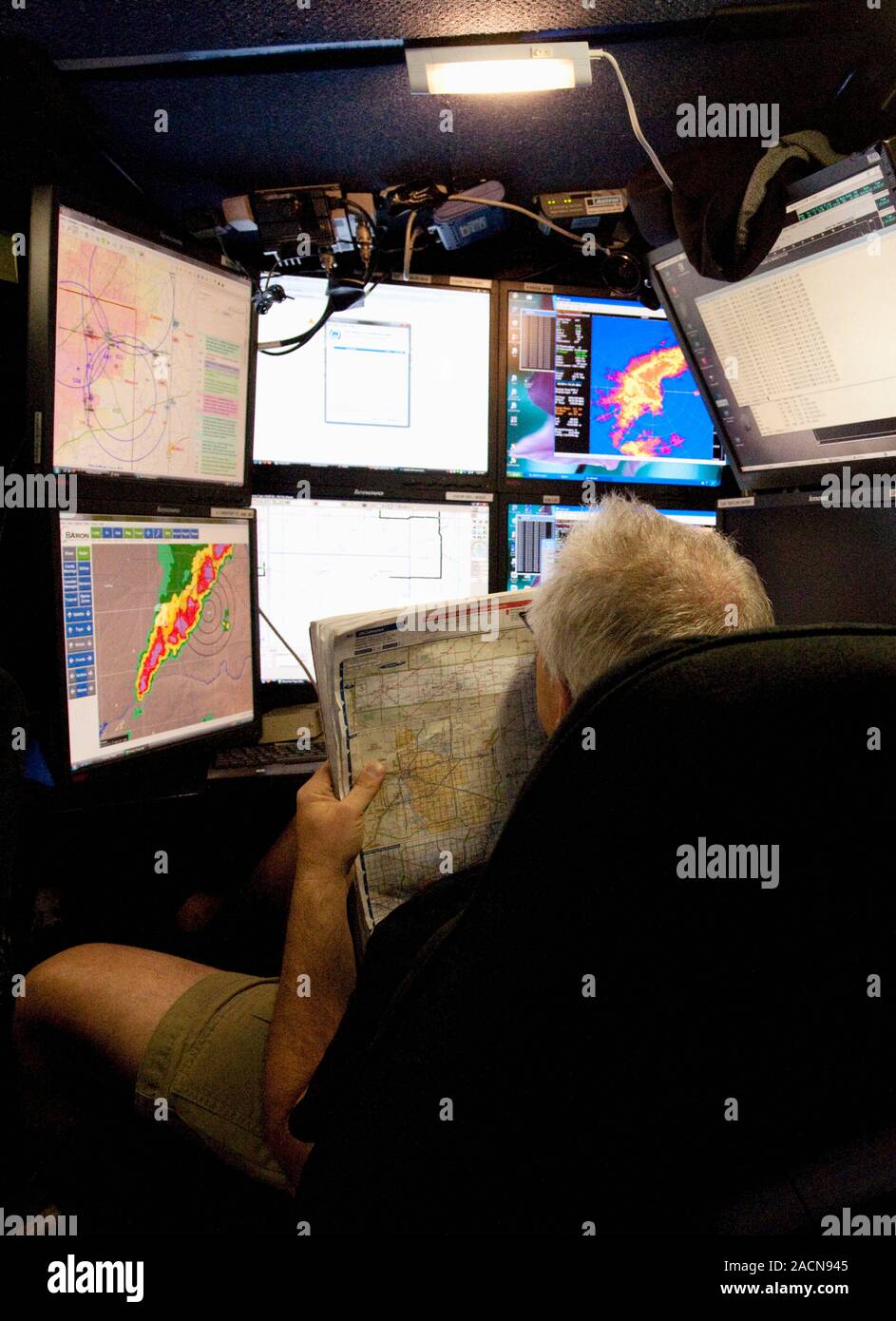 Storm chasing. Tornado researcher, Joshua Wurman, inventor of the ...