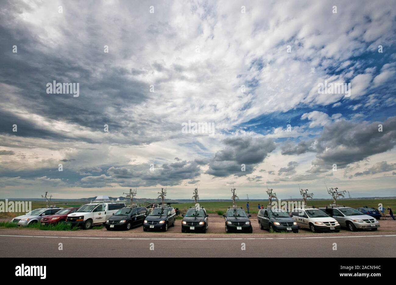 Storm chasing. Tornado probe vehicles with roof-mounted mobile mesonet ...