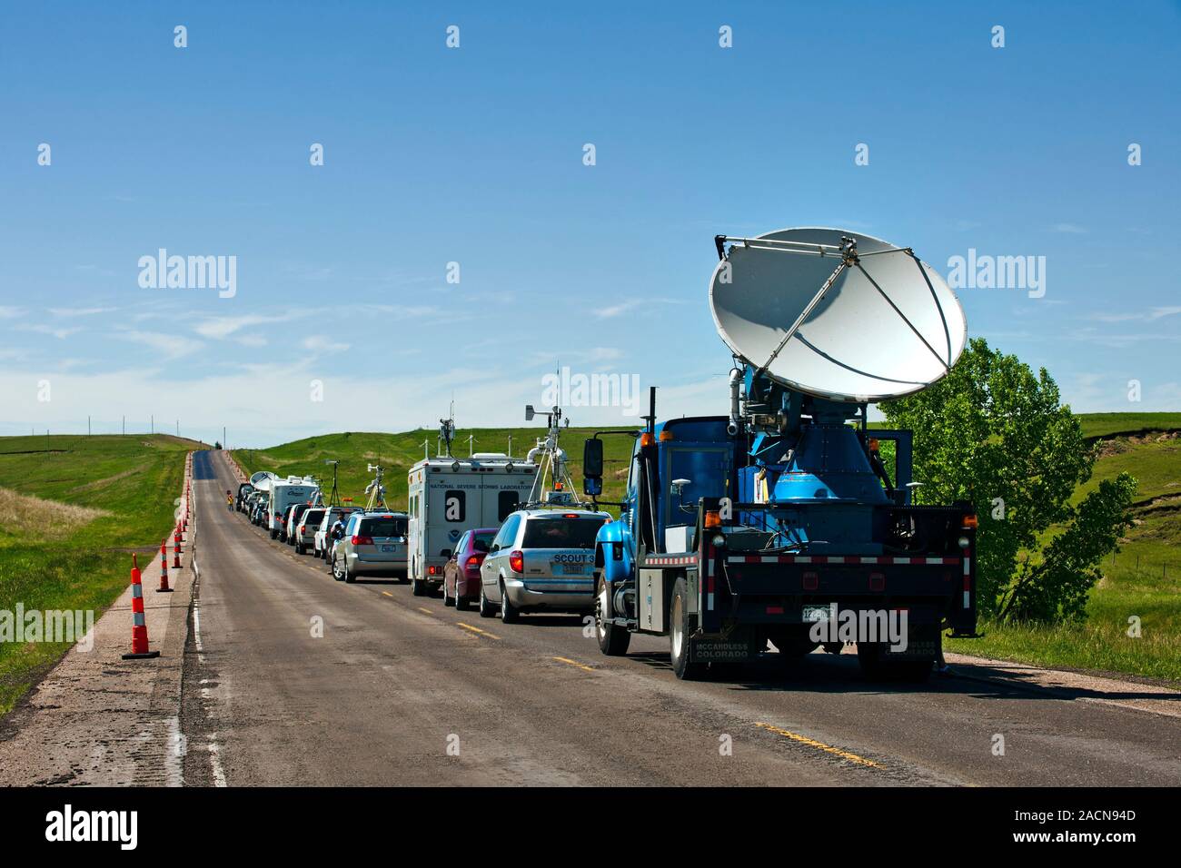 Storm chasing. VORTEX 2 vehicles in convoy, with a Doppler on Wheels ...