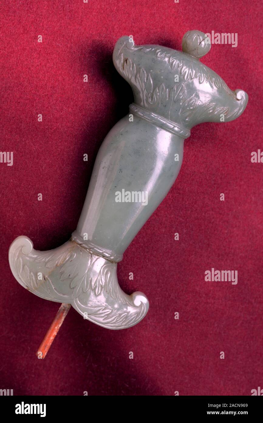 Jade sword handle. Sword handle carved from nephrite, one of two ...