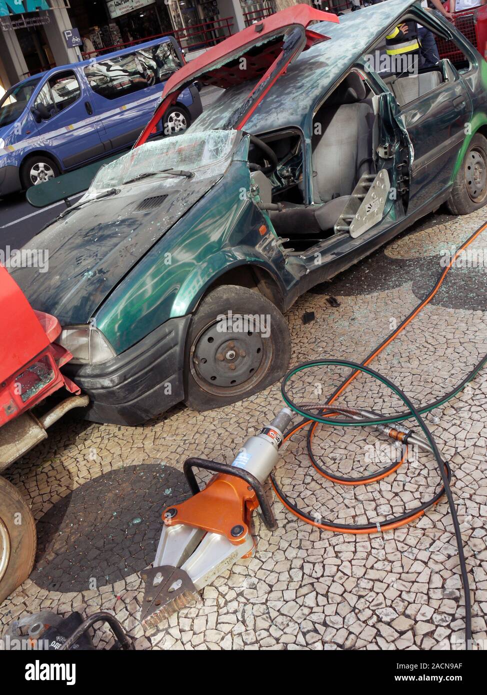 Car crash rescue. The body of the car has been cut open by firefighters ...