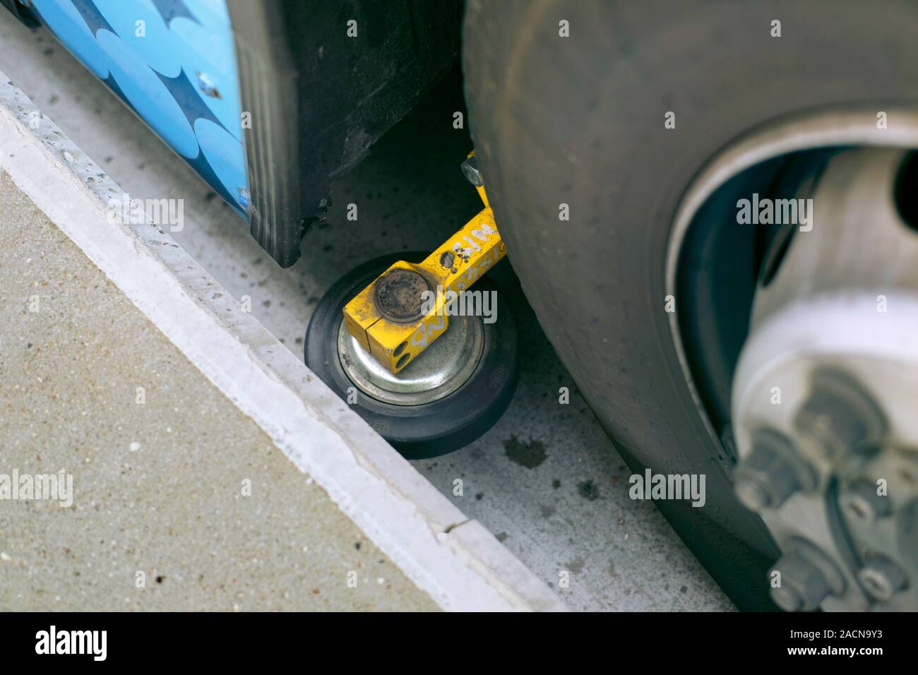 Guided busway wheel mechanism. Close-up of the horizontal guide wheel ...