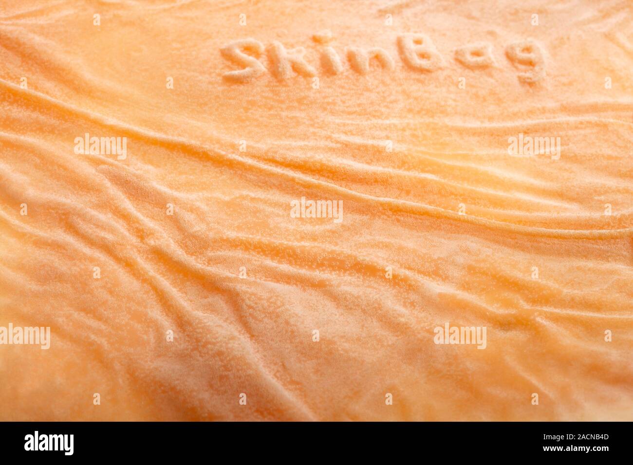 Imitation skin. Close-up of the surface of a latex material designed to mimic the look and feel ...