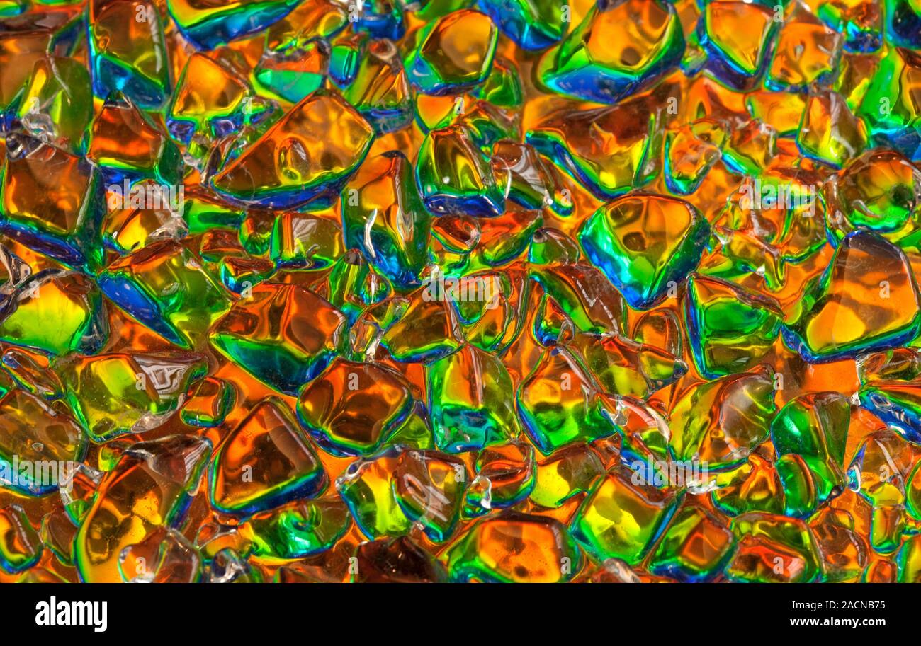 Glass-based material. Close-up of the structure of coated glass known ...
