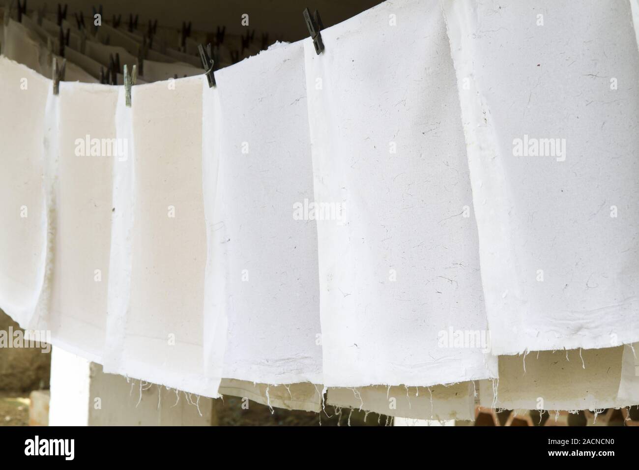 Handmade paper dries in the air Stock Photo - Alamy