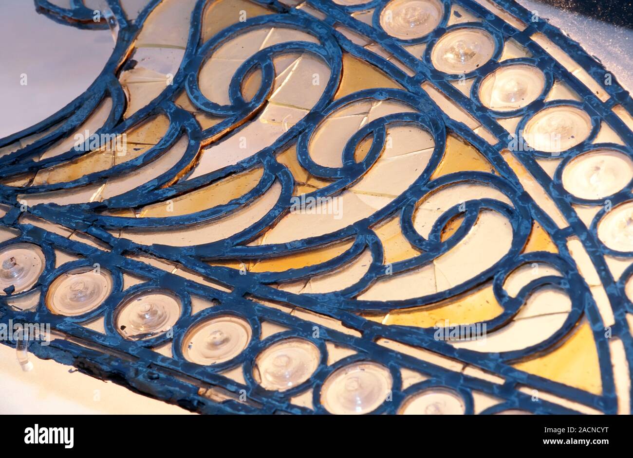 Stained-glass window recovered from the RMS Titanic. The window has ...