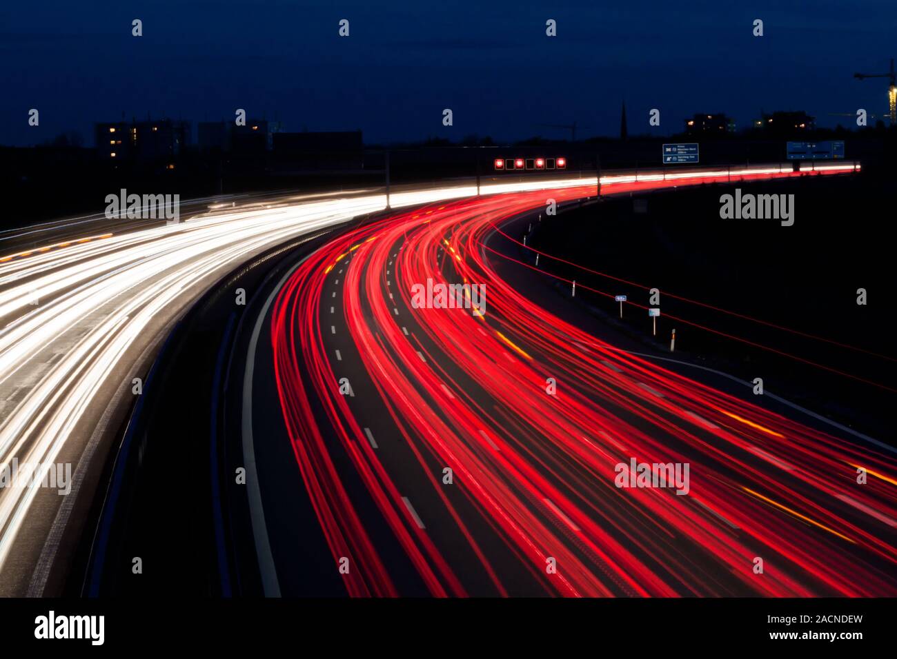 Cars on highway at night Stock Photo - Alamy