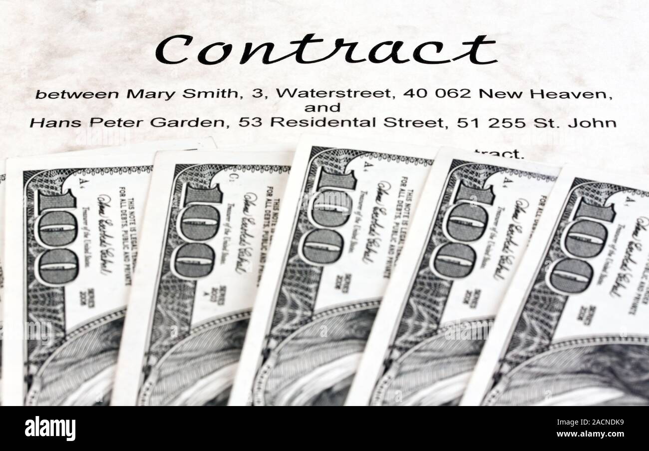 Dollar banknotes and English contract Stock Photo - Alamy