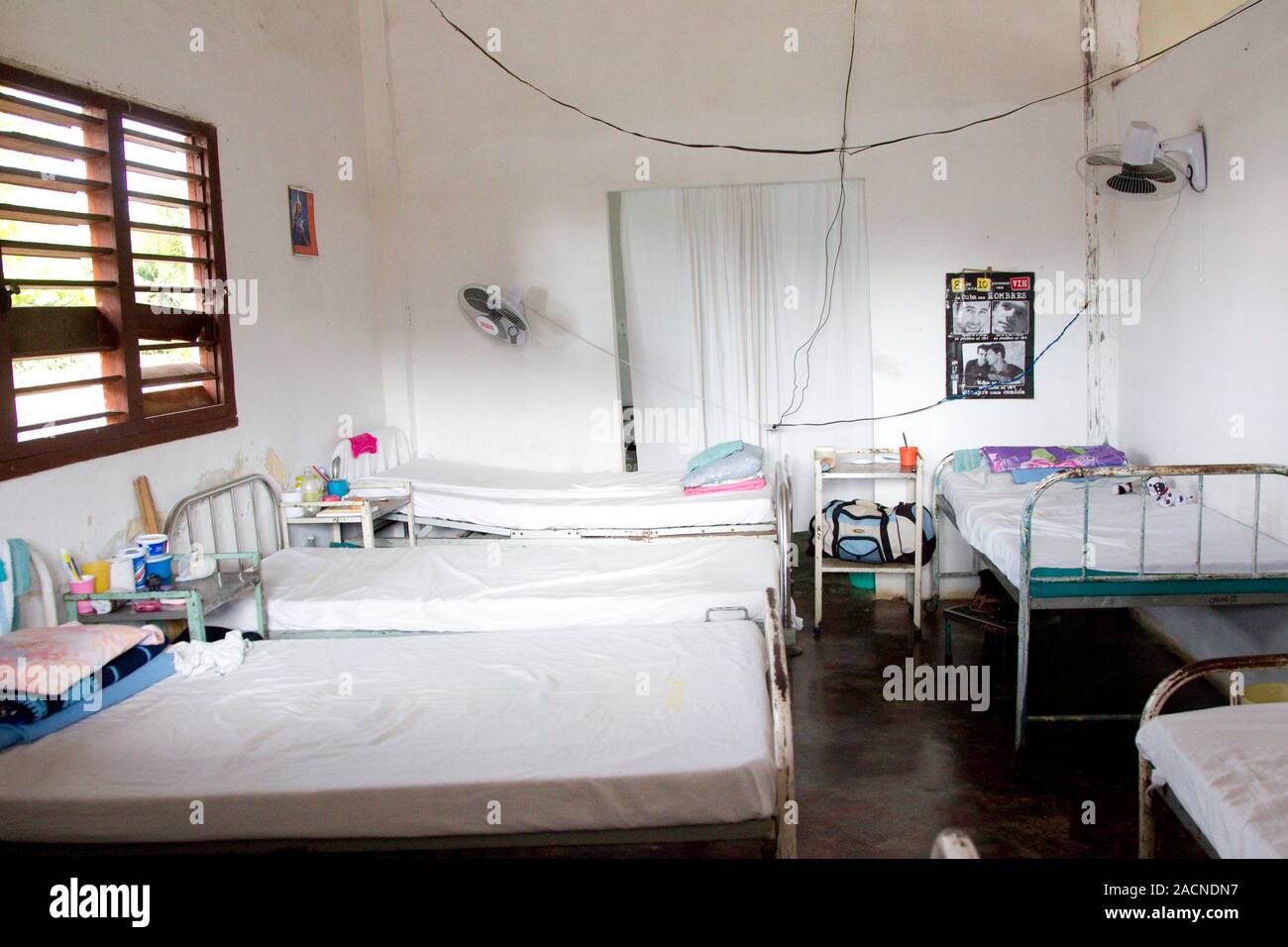 Hospital ward, Cuba. On the wall in the background at right is a public ...