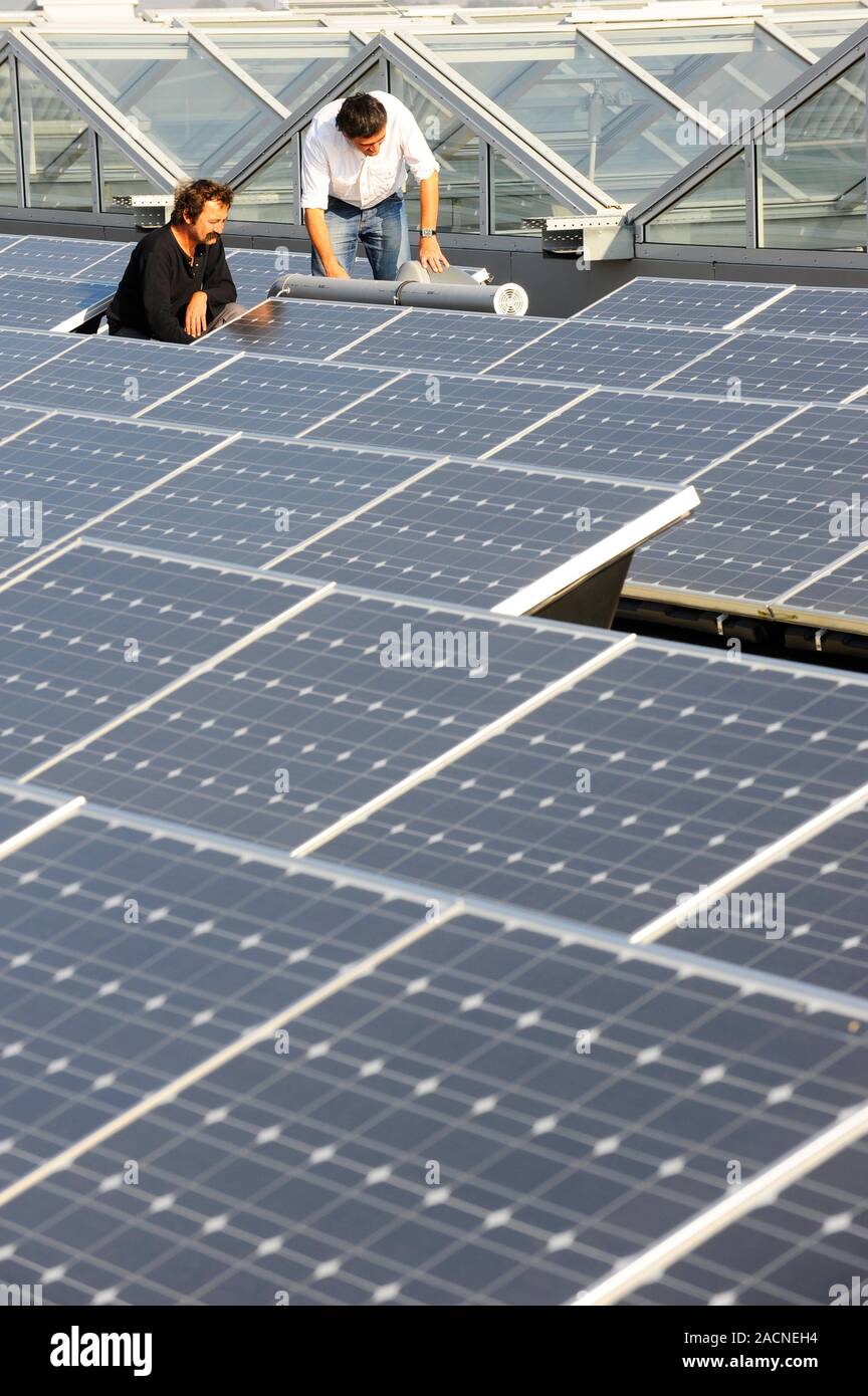 Solar panels. Photovoltaic cell array. Photographed at Lycee Kyoto ...