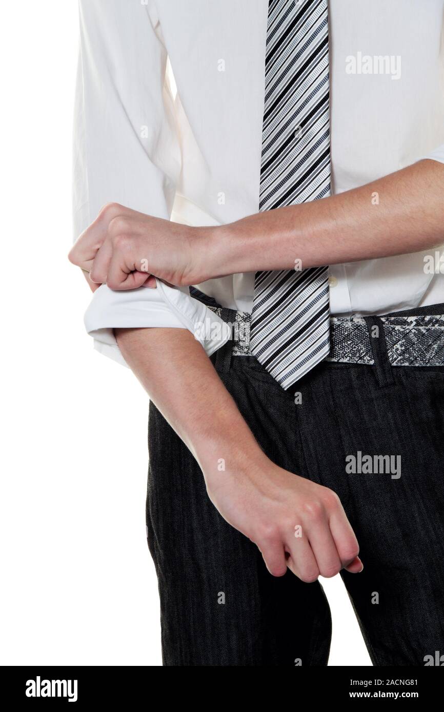 Successful man rolls up his sleeves Stock Photo - Alamy Successful man rolls up his sleeves Stock Photo - Alamy