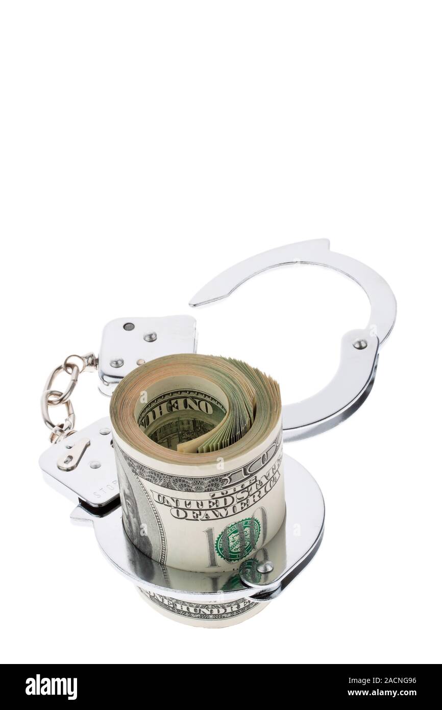 Dollar banknotes with handcuffs Stock Photo - Alamy