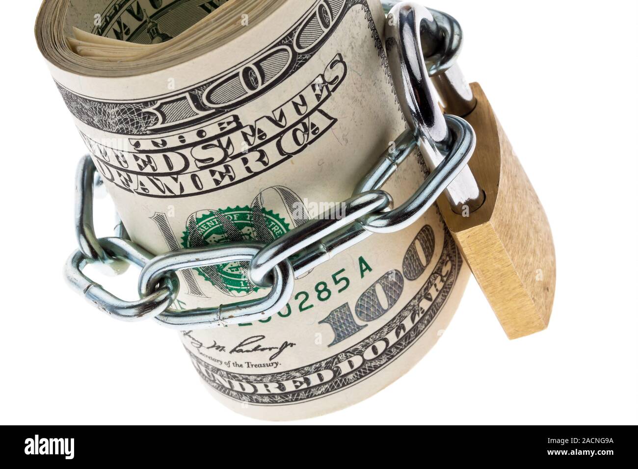 Dollar banknotes are locked with a lock Stock Photo - Alamy