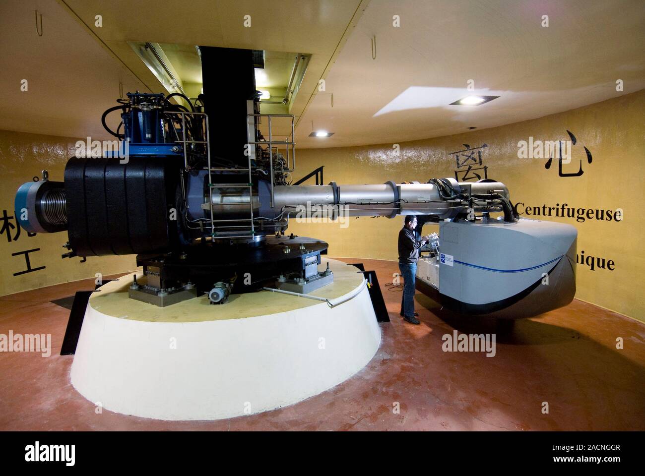 Geotechnical centrifuge. Technician with a centrifuge used for testing ... Geotechnical centrifuge. Technician with a centrifuge used for testing ...