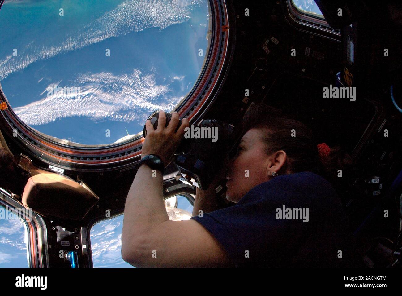 Astronaut Cady Coleman, ISS. American astronaut Cady Coleman taking ...