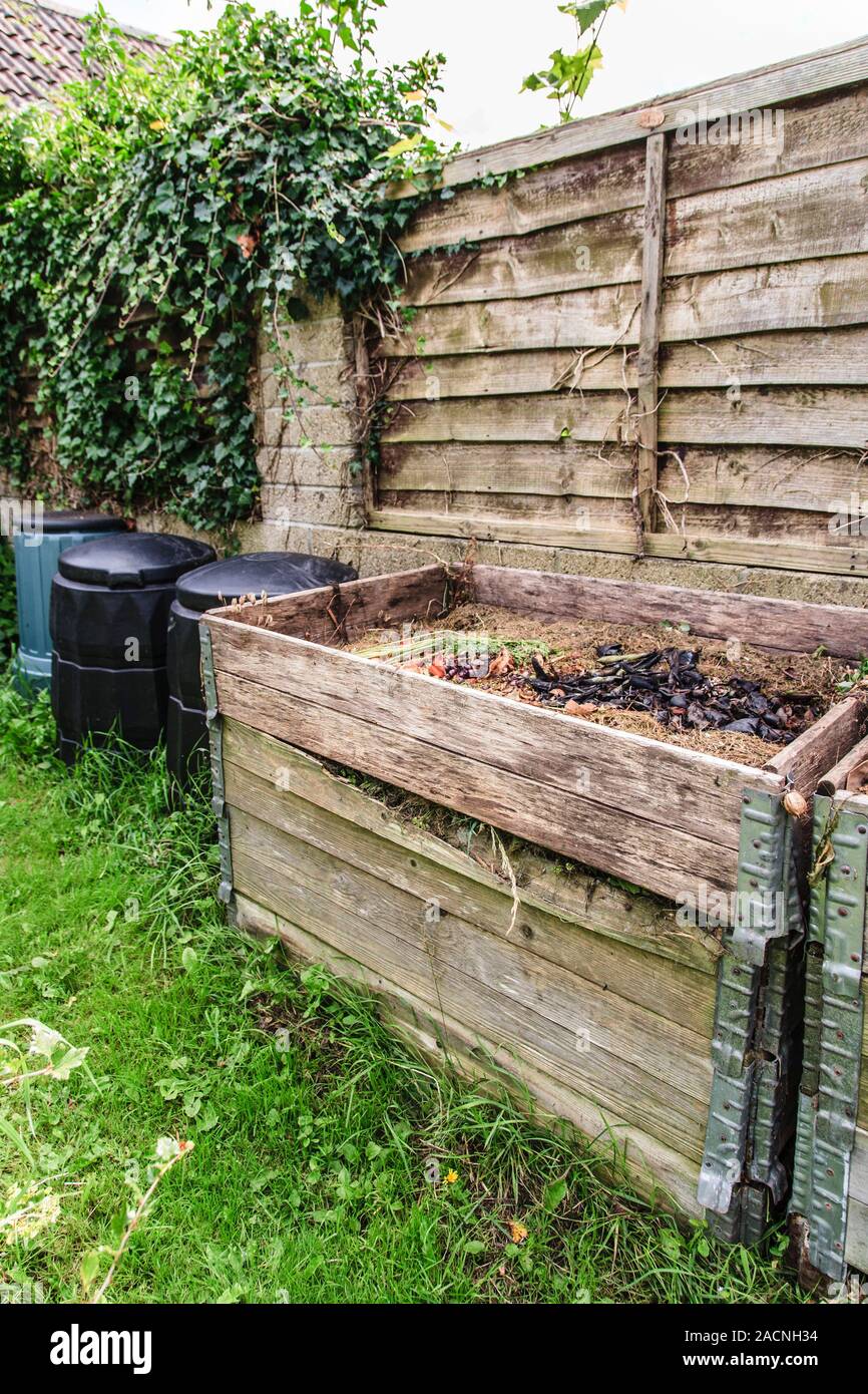 Compost heap and bins for garden and kitchen waste in a residential ...
