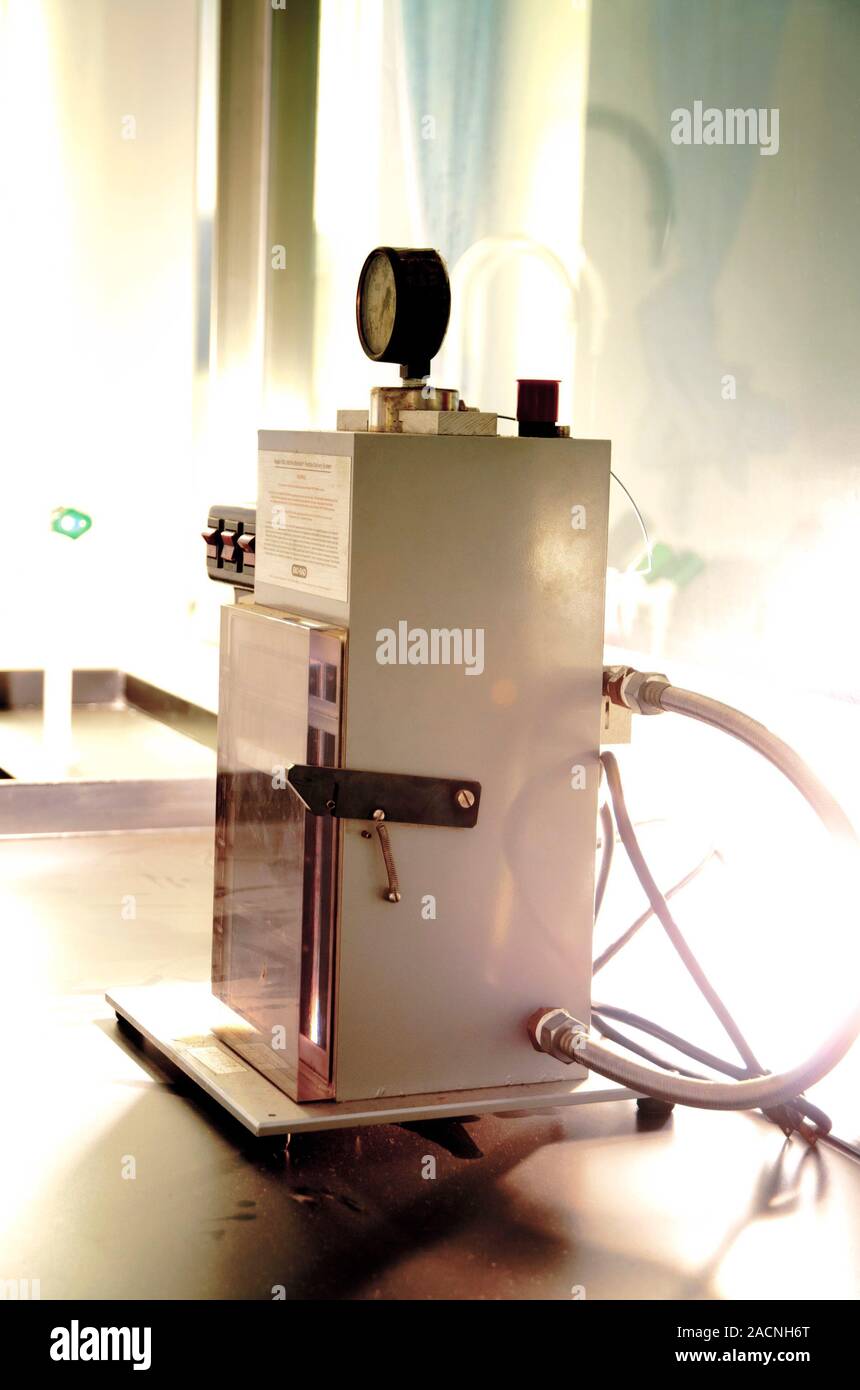 Gene gun in a lab. A gene gun, or a biolistic particle delivery system ...