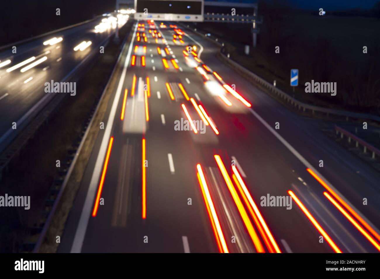 Traffic on the motorway at night Stock Photo - Alamy