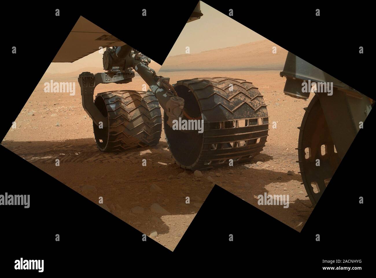 Curiosity rover's wheels. This view shows the three left-hand wheels of ...