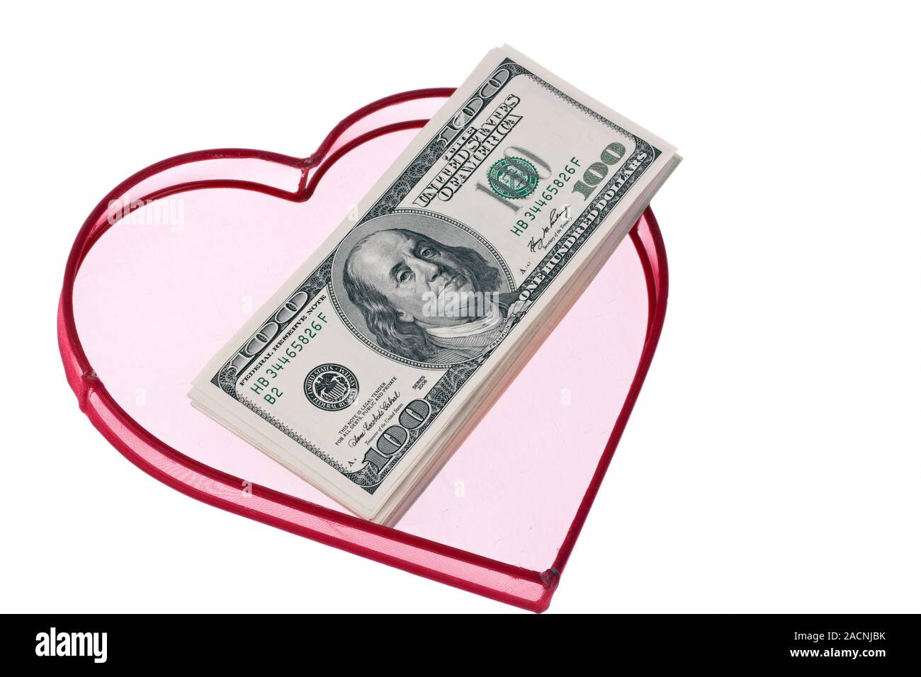 Dollar banknotes in a heart Stock Photo - Alamy