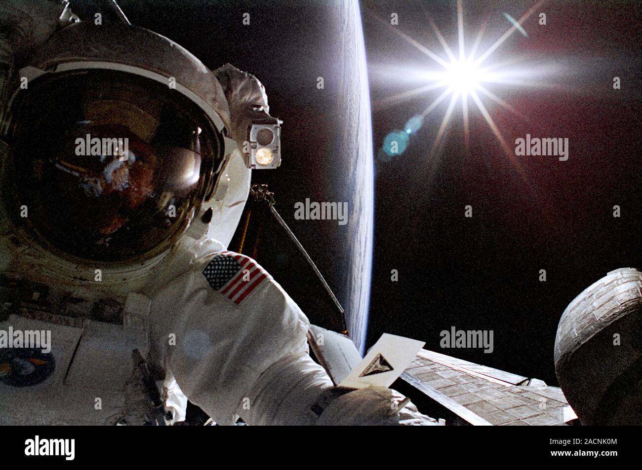 Spacewalk. Astronaut Joseph R. Tanner performs a spacewalk during a ...