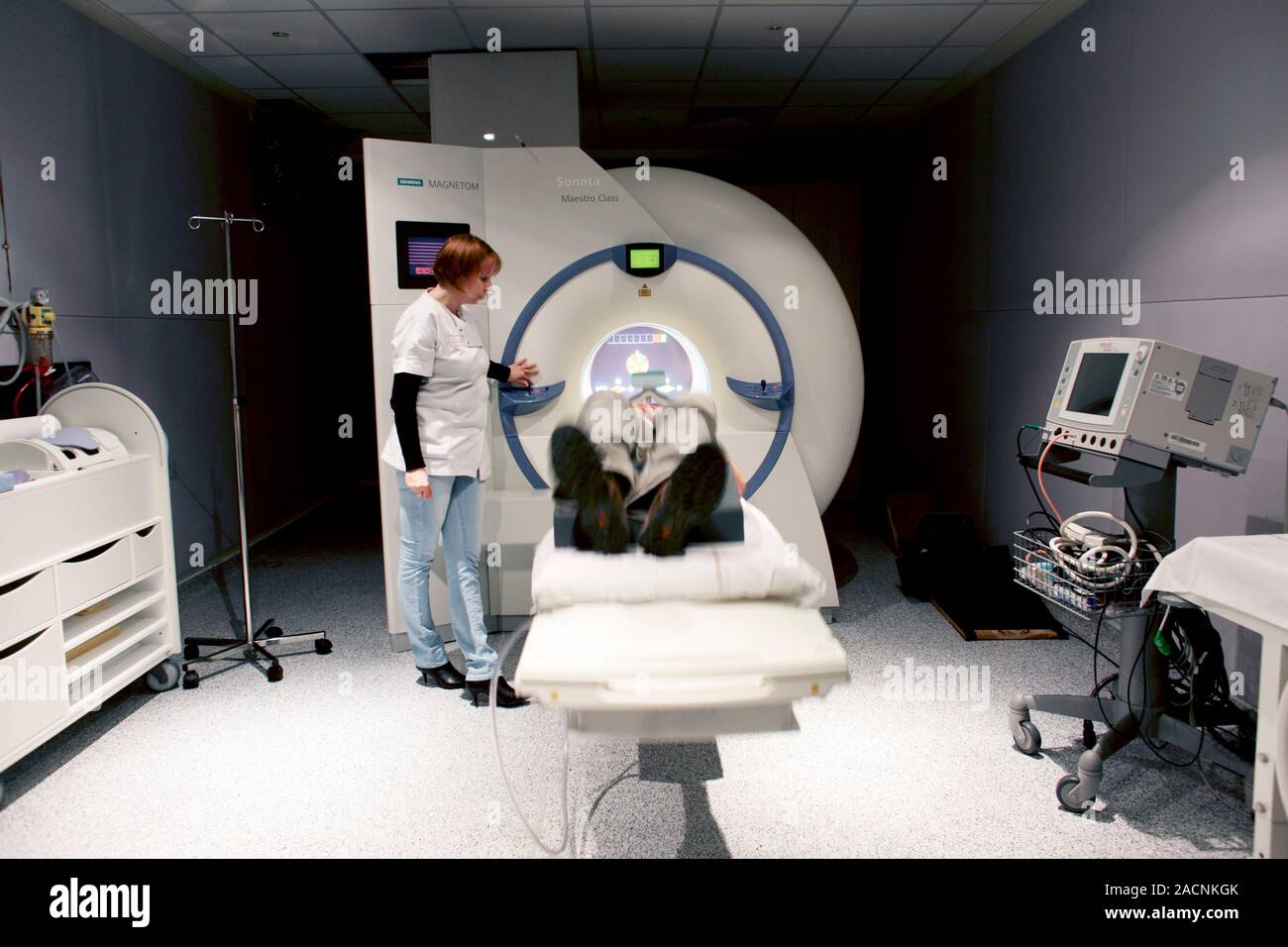Gambling addiction research. Participant undergoing an MRI (magnetic ...