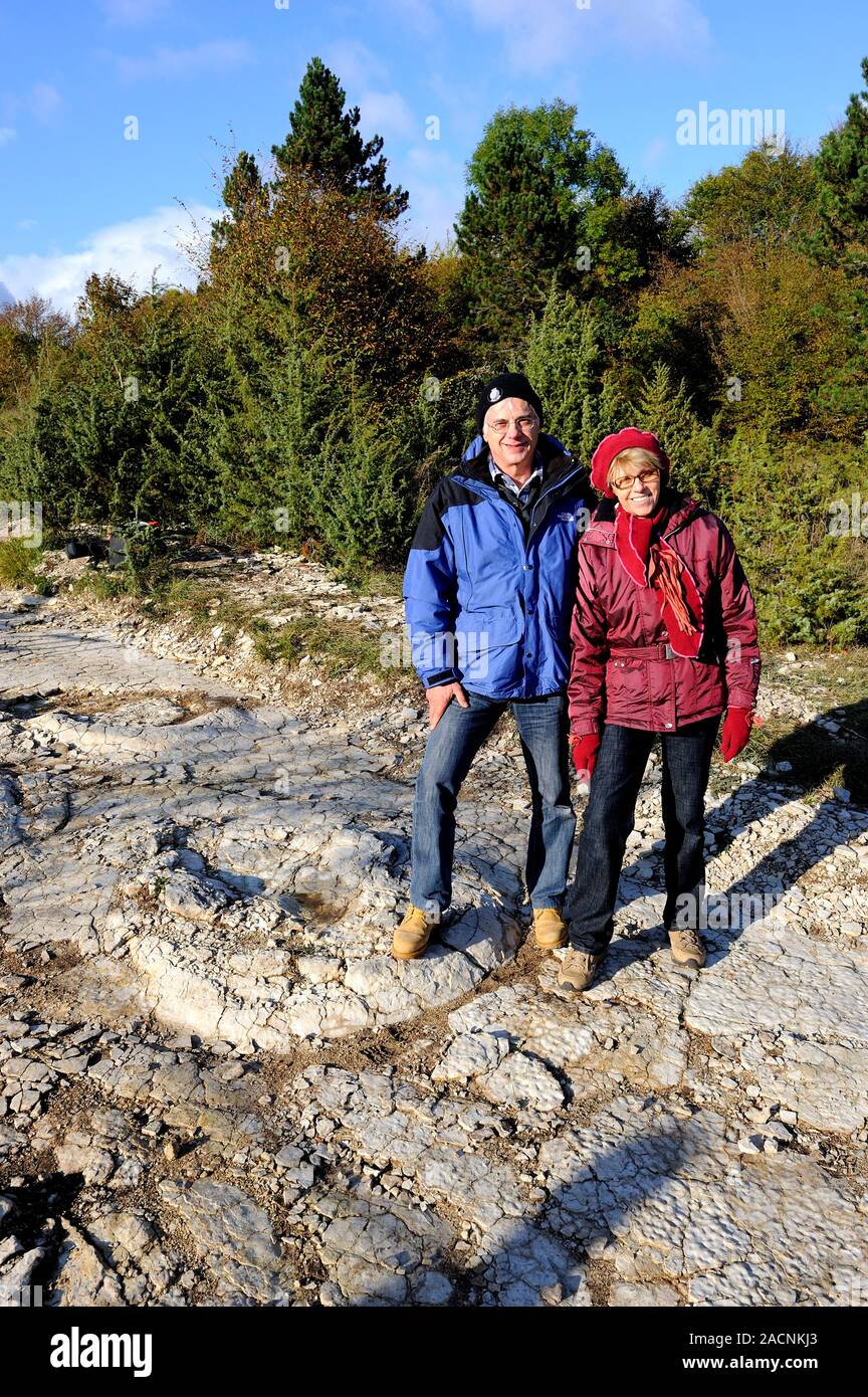 Dinosaur fossil footprints. Palaeontologists Patrice Landry and Marie ... Dinosaur fossil footprints. Palaeontologists Patrice Landry and Marie ...