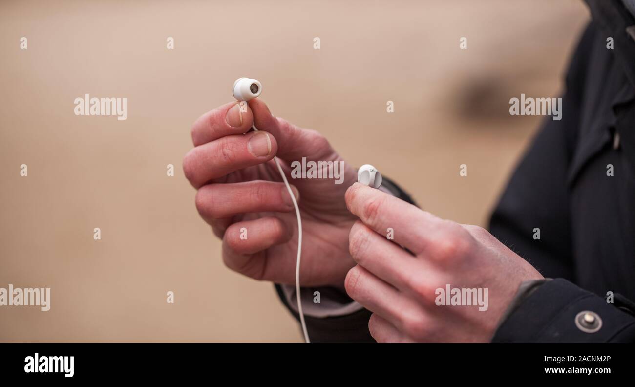 Hold ear hi-res stock photography and images - Alamy