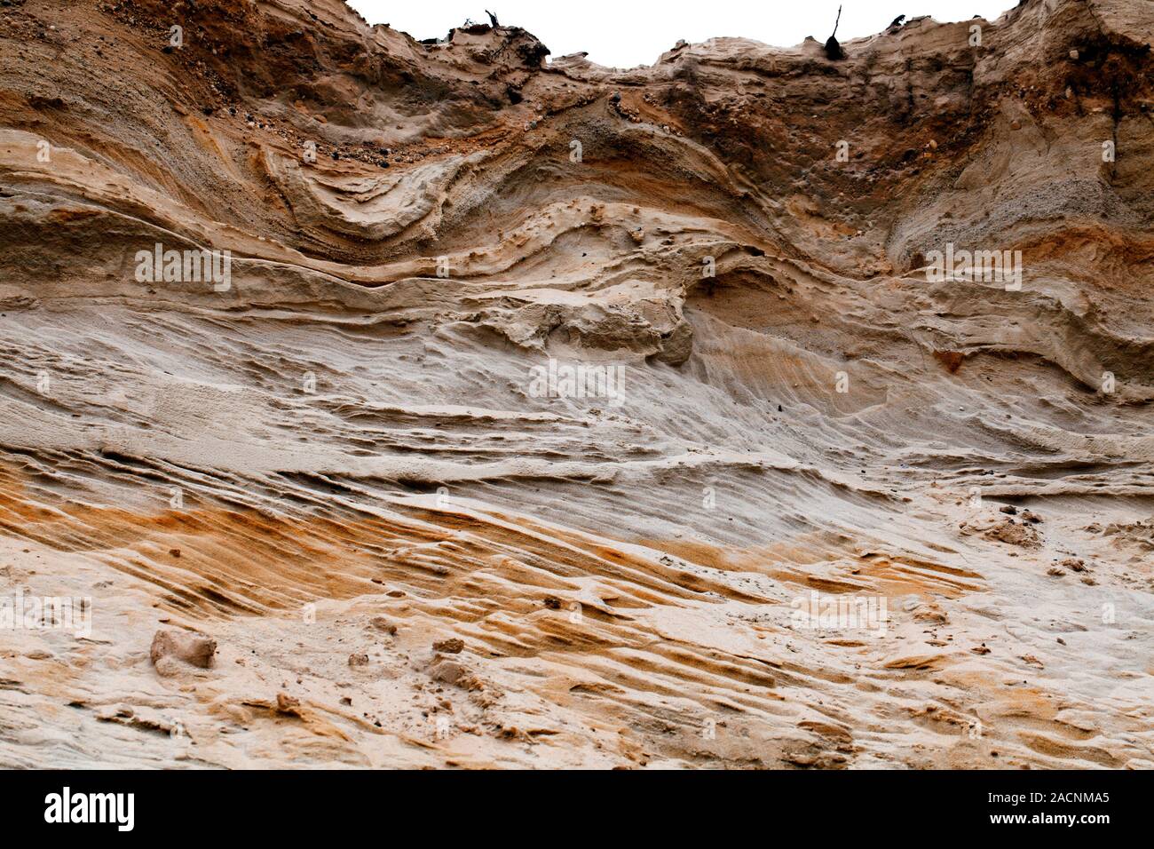 Soil fluction in river deposits. Close-up of sandy river deposits ...