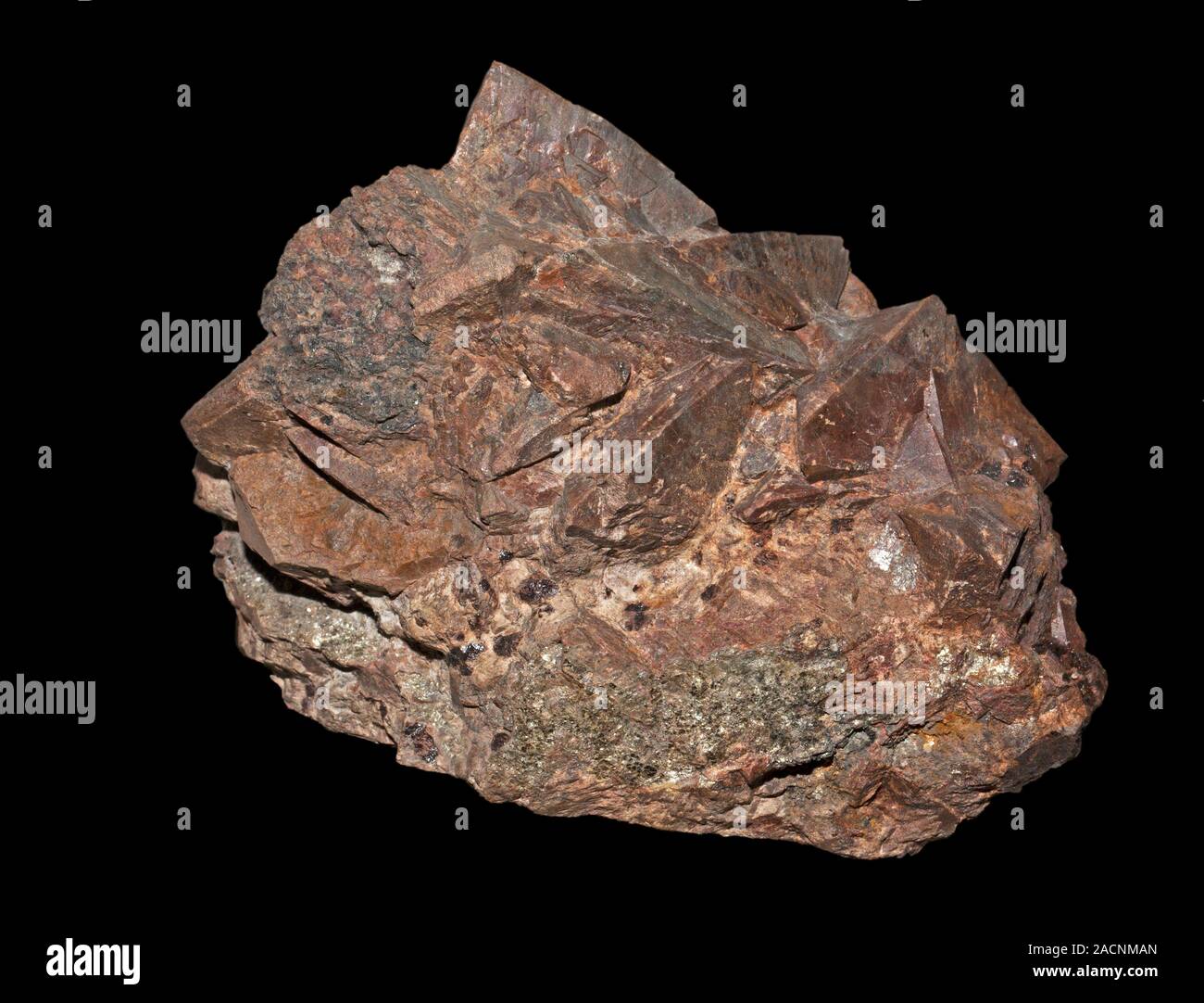 Xenotime crystals in host rock. Xenotime (YPO4) is a rare earth ...