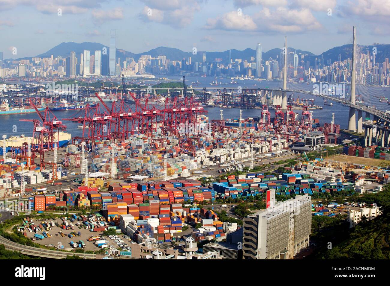 Container port, Hong Kong. View over shipping containers and cranes at ...