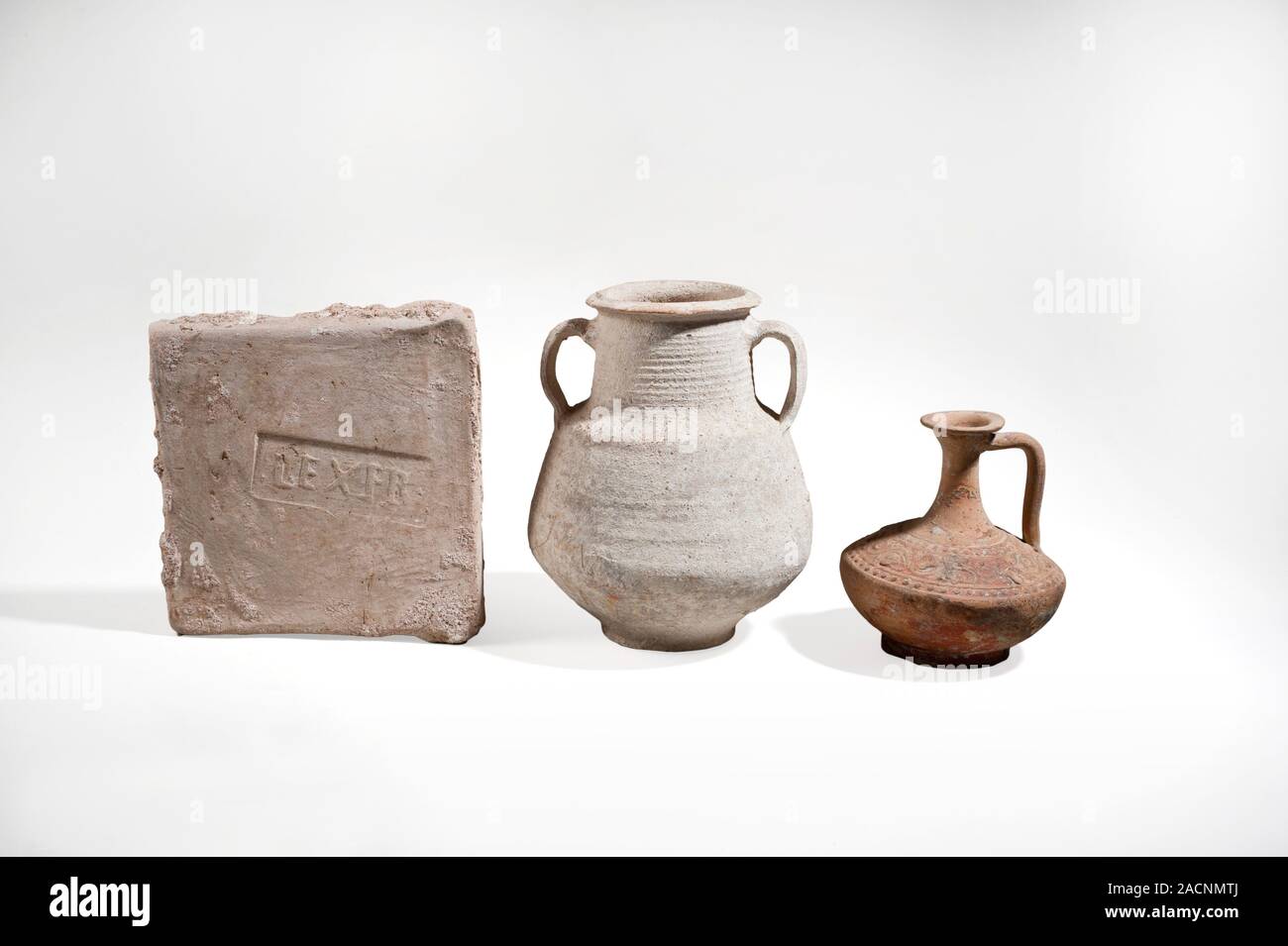 1st century Roman terracotta objects. From left to right Ceramic brick ...