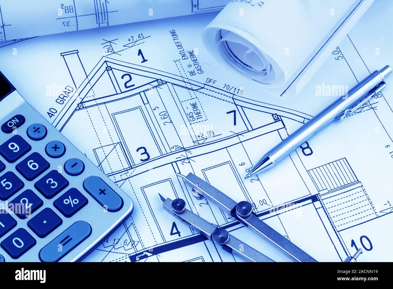 House plan with pocket calculator Stock Photo - Alamy