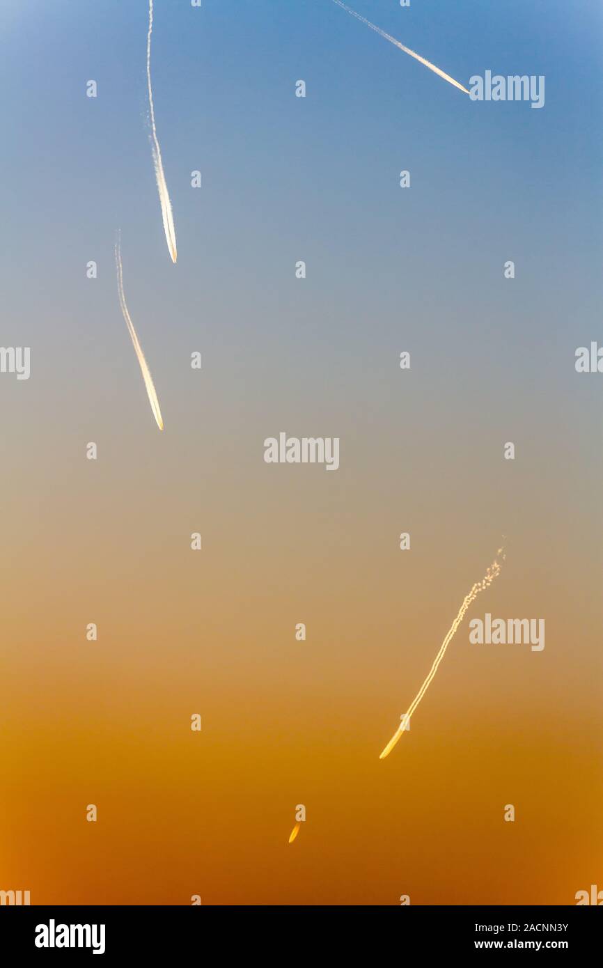 Condensation trails in the sky Stock Photo - Alamy