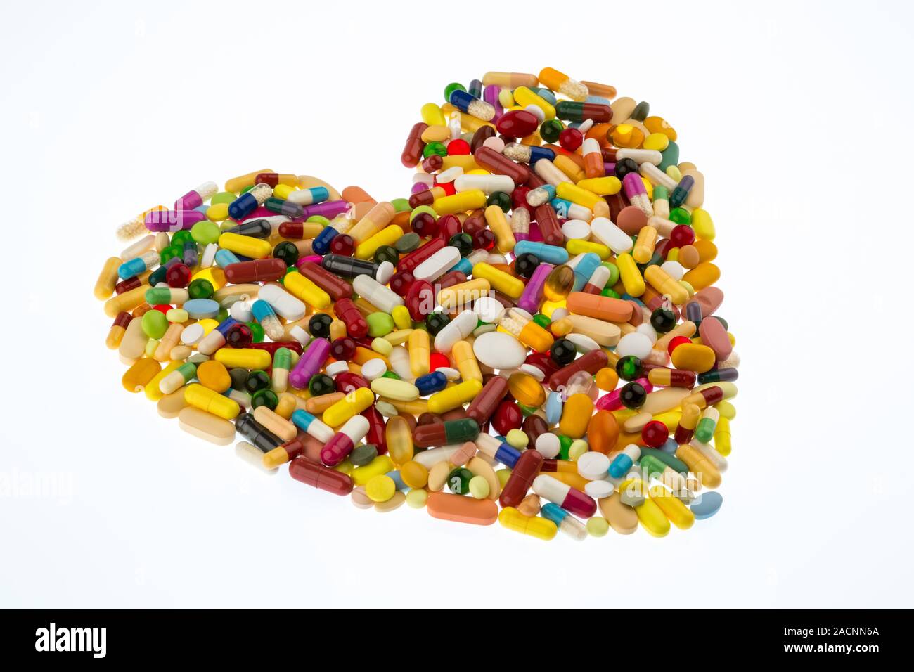 Colourful heart shaped tablets Stock Photo - Alamy
